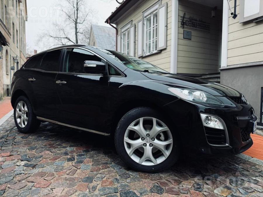 Black Mazda CX-7 2011 in Cesis, with an engine capacity of 2.20 L and mileage of 0 thousand km for 5600 €, photo 3 on AUTOMOTO.COM.LV