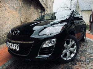 Black Mazda CX-7 2011 in Cesis, with an engine capacity of 2.20 L and mileage of 0 thousand km for 5600 €, photo 4 on AUTOMOTO.COM.LV