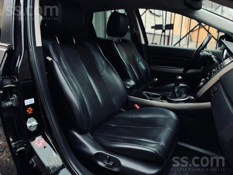Black Mazda CX-7 2011 in Cesis, with an engine capacity of 2.20 L and mileage of 0 thousand km for 5600 €, photo 12 on AUTOMOTO.COM.LV