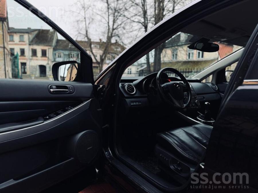Black Mazda CX-7 2011 in Cesis, with an engine capacity of 2.20 L and mileage of 0 thousand km for 5600 €, photo 25 on AUTOMOTO.COM.LV