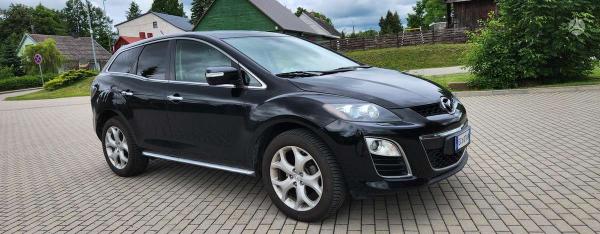 Black Mazda CX-7 2011 in Birzai, with an engine capacity of 2.20 L and mileage of 260 thousand km for 4799 €, photo 1 on AUTOMOTO.COM.LV