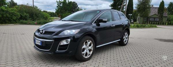 Black Mazda CX-7 2011 in Birzai, with an engine capacity of 2.20 L and mileage of 260 thousand km for 4799 €, photo 3 on AUTOMOTO.COM.LV