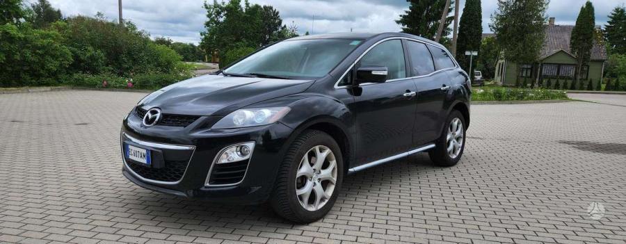 Black Mazda CX-7 2011 in Birzai, with an engine capacity of 2.20 L and mileage of 260 thousand km for 4799 €, photo 4 on AUTOMOTO.COM.LV