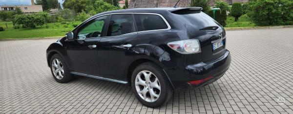 Black Mazda CX-7 2011 in Birzai, with an engine capacity of 2.20 L and mileage of 260 thousand km for 4799 €, photo 4 on AUTOMOTO.COM.LV