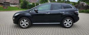 Black Mazda CX-7 2011 in Birzai, with an engine capacity of 2.20 L and mileage of 260 thousand km for 4799 €, photo 8 on AUTOMOTO.COM.LV