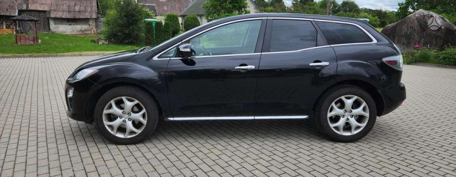 Black Mazda CX-7 2011 in Birzai, with an engine capacity of 2.20 L and mileage of 260 thousand km for 4799 €, photo 8 on AUTOMOTO.COM.LV