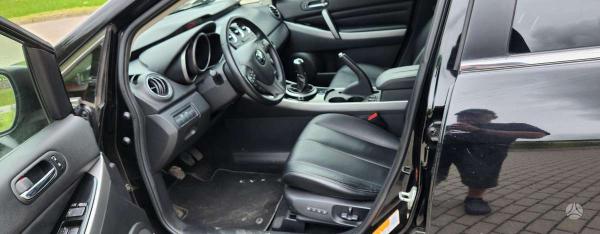 Black Mazda CX-7 2011 in Birzai, with an engine capacity of 2.20 L and mileage of 260 thousand km for 4799 €, photo 9 on AUTOMOTO.COM.LV