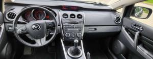 Black Mazda CX-7 2011 in Birzai, with an engine capacity of 2.20 L and mileage of 260 thousand km for 4799 €, photo 11 on AUTOMOTO.COM.LV