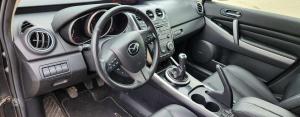 Black Mazda CX-7 2011 in Birzai, with an engine capacity of 2.20 L and mileage of 260 thousand km for 4799 €, photo 13 on AUTOMOTO.COM.LV
