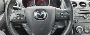 Black Mazda CX-7 2011 in Birzai, with an engine capacity of 2.20 L and mileage of 260 thousand km for 4799 €, photo 17 on AUTOMOTO.COM.LV
