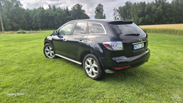 Melns Mazda CX-7 2011 Akmenė, ar dzinēja tilpumu 2.20 L un nobraukumu 220 tūkst. km par 3000 €, foto 2 vietnē AUTOMOTO.COM.LV