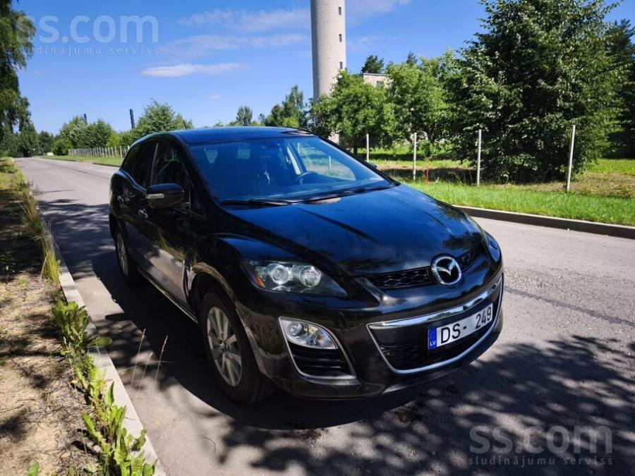 Melns Mazda CX-7 2011 Valmiera, ar dzinēja tilpumu 2.20 L un nobraukumu 272 tūkst. km par 5150 €, foto 1 vietnē AUTOMOTO.COM.LV