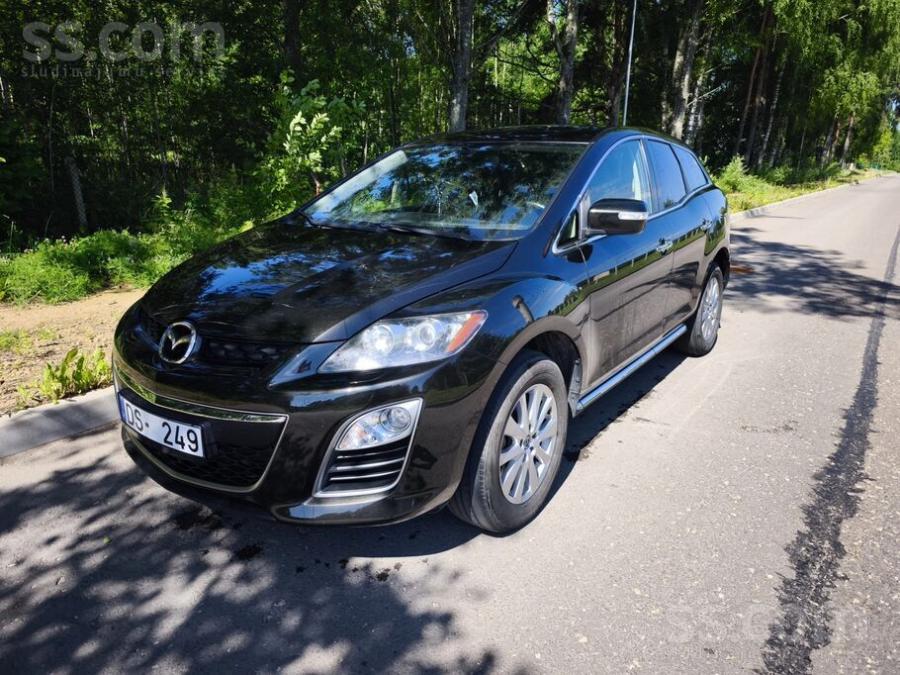 Melns Mazda CX-7 2011 Valmiera, ar dzinēja tilpumu 2.20 L un nobraukumu 272 tūkst. km par 5150 €, foto 3 vietnē AUTOMOTO.COM.LV