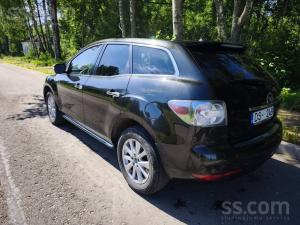 Melns Mazda CX-7 2011 Valmiera, ar dzinēja tilpumu 2.20 L un nobraukumu 272 tūkst. km par 5150 €, foto 4 vietnē AUTOMOTO.COM.LV