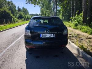 Melns Mazda CX-7 2011 Valmiera, ar dzinēja tilpumu 2.20 L un nobraukumu 272 tūkst. km par 5150 €, foto 6 vietnē AUTOMOTO.COM.LV