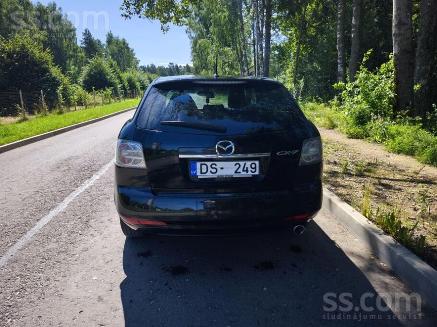 Melns Mazda CX-7 2011 Valmiera, ar dzinēja tilpumu 2.20 L un nobraukumu 272 tūkst. km par 5150 €, foto 6 vietnē AUTOMOTO.COM.LV