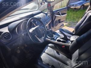 Melns Mazda CX-7 2011 Valmiera, ar dzinēja tilpumu 2.20 L un nobraukumu 272 tūkst. km par 5150 €, foto 10 vietnē AUTOMOTO.COM.LV