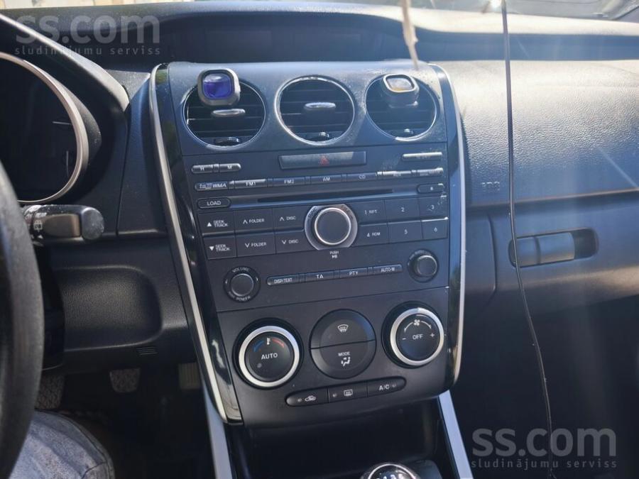 Melns Mazda CX-7 2011 Valmiera, ar dzinēja tilpumu 2.20 L un nobraukumu 272 tūkst. km par 5150 €, foto 15 vietnē AUTOMOTO.COM.LV