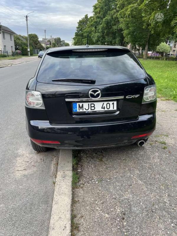 Black Mazda CX-7 2011 in Panevezys, with an engine capacity of 2.18 L and mileage of 200 thousand km for 2500 €, photo 2 on AUTOMOTO.COM.LV