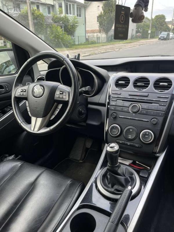 Black Mazda CX-7 2011 in Panevezys, with an engine capacity of 2.18 L and mileage of 200 thousand km for 2500 €, photo 4 on AUTOMOTO.COM.LV
