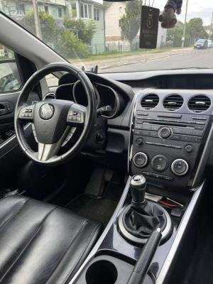 Black Mazda CX-7 2011 in Panevezys, with an engine capacity of 2.18 L and mileage of 200 thousand km for 2500 €, photo 5 on AUTOMOTO.COM.LV