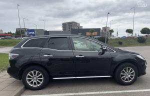 Black Mazda CX-7 2011 in Vilnius, with an engine capacity of 2.20 L and mileage of 282 thousand km for 3900 €, photo 4 on AUTOMOTO.COM.LV