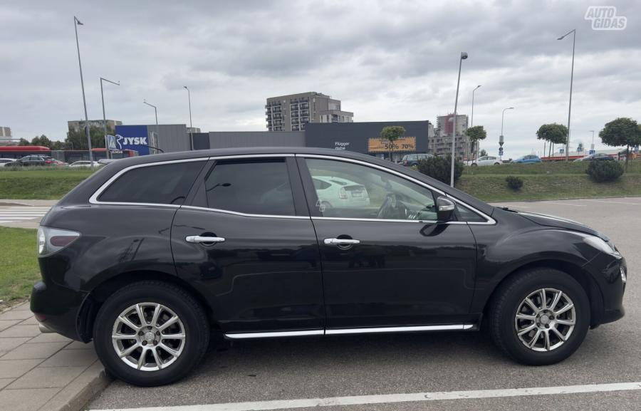 Black Mazda CX-7 2011 in Vilnius, with an engine capacity of 2.20 L and mileage of 282 thousand km for 3900 €, photo 4 on AUTOMOTO.COM.LV