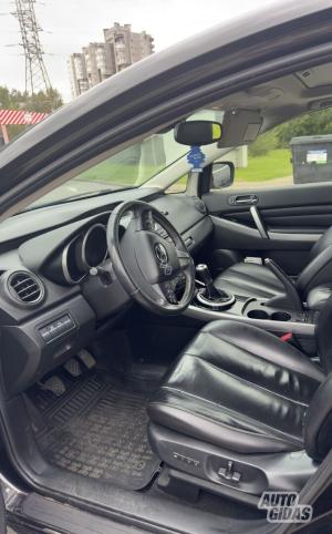 Black Mazda CX-7 2011 in Vilnius, with an engine capacity of 2.20 L and mileage of 282 thousand km for 3900 €, photo 11 on AUTOMOTO.COM.LV