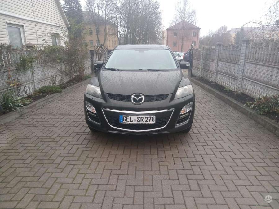 Melns Mazda CX-7 2012 Tauragė, ar dzinēja tilpumu 2.18 L un nobraukumu 376 tūkst. km par 4450 €, foto 1 vietnē AUTOMOTO.COM.LV
