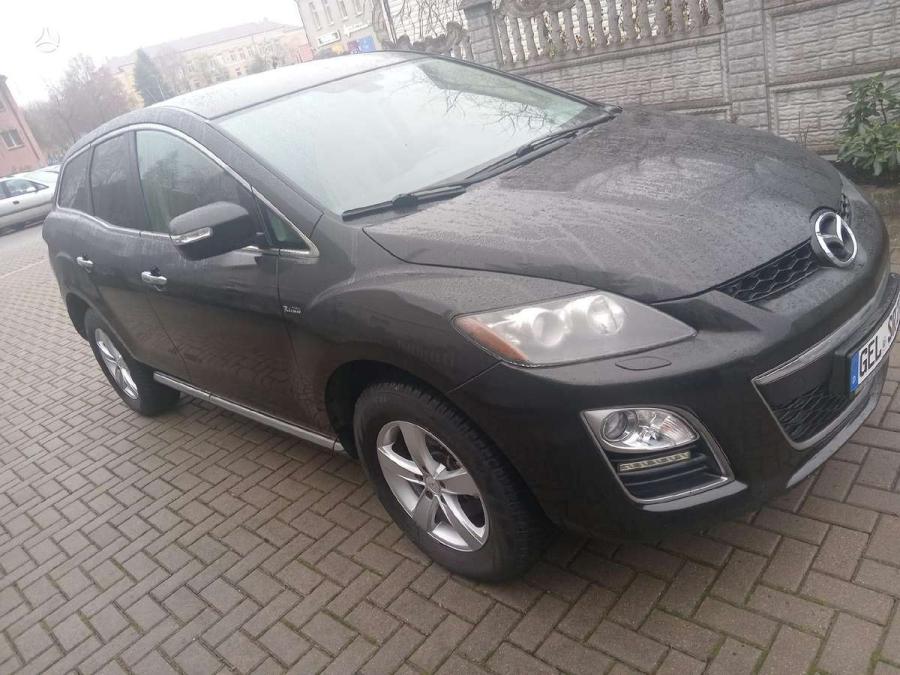Melns Mazda CX-7 2012 Tauragė, ar dzinēja tilpumu 2.18 L un nobraukumu 376 tūkst. km par 4450 €, foto 2 vietnē AUTOMOTO.COM.LV