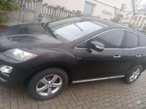 Melns Mazda CX-7 2012 Tauragė, ar dzinēja tilpumu 2.18 L un nobraukumu 376 tūkst. km par 4450 €, foto 3 vietnē AUTOMOTO.COM.LV