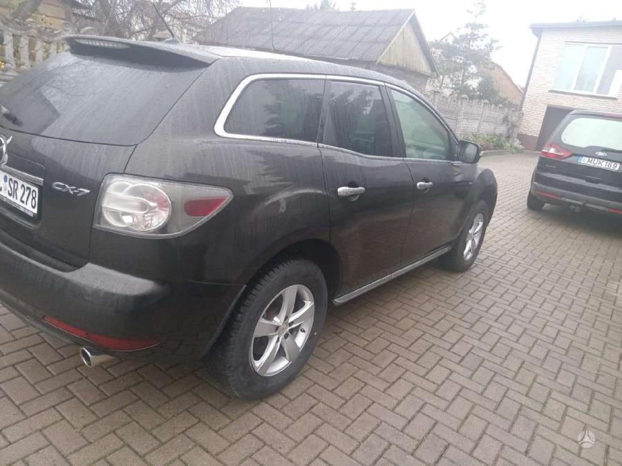 Melns Mazda CX-7 2012 Tauragė, ar dzinēja tilpumu 2.18 L un nobraukumu 376 tūkst. km par 4450 €, foto 5 vietnē AUTOMOTO.COM.LV