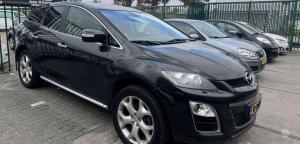 Black Mazda CX-7 2012 in Kaunas, with an engine capacity of 2.18 L and mileage of 220 thousand km for 2399 €, photo  on AUTOMOTO.COM.LV
