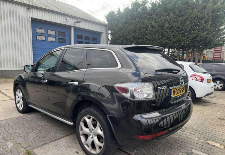 Melns Mazda CX-7 2012 Kauņa, ar dzinēja tilpumu 2.18 L un nobraukumu 220 tūkst. km par 2399 €, foto 5 vietnē AUTOMOTO.COM.LV