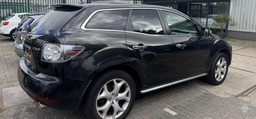 Melns Mazda CX-7 2012 Kauņa, ar dzinēja tilpumu 2.18 L un nobraukumu 220 tūkst. km par 2399 €, foto 6 vietnē AUTOMOTO.COM.LV