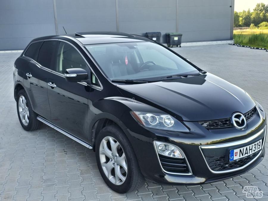 Black Mazda CX-7 2012 in Siauliai, with an engine capacity of 2.20 L and mileage of 216 thousand km for 4000 €, photo 4 on AUTOMOTO.COM.LV