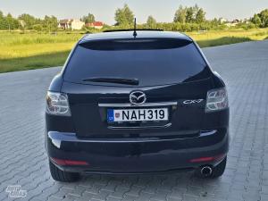 Black Mazda CX-7 2012 in Siauliai, with an engine capacity of 2.20 L and mileage of 216 thousand km for 4000 €, photo 6 on AUTOMOTO.COM.LV