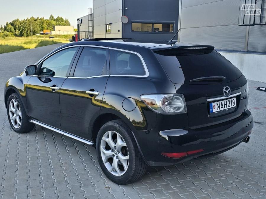 Black Mazda CX-7 2012 in Siauliai, with an engine capacity of 2.20 L and mileage of 216 thousand km for 4000 €, photo 7 on AUTOMOTO.COM.LV