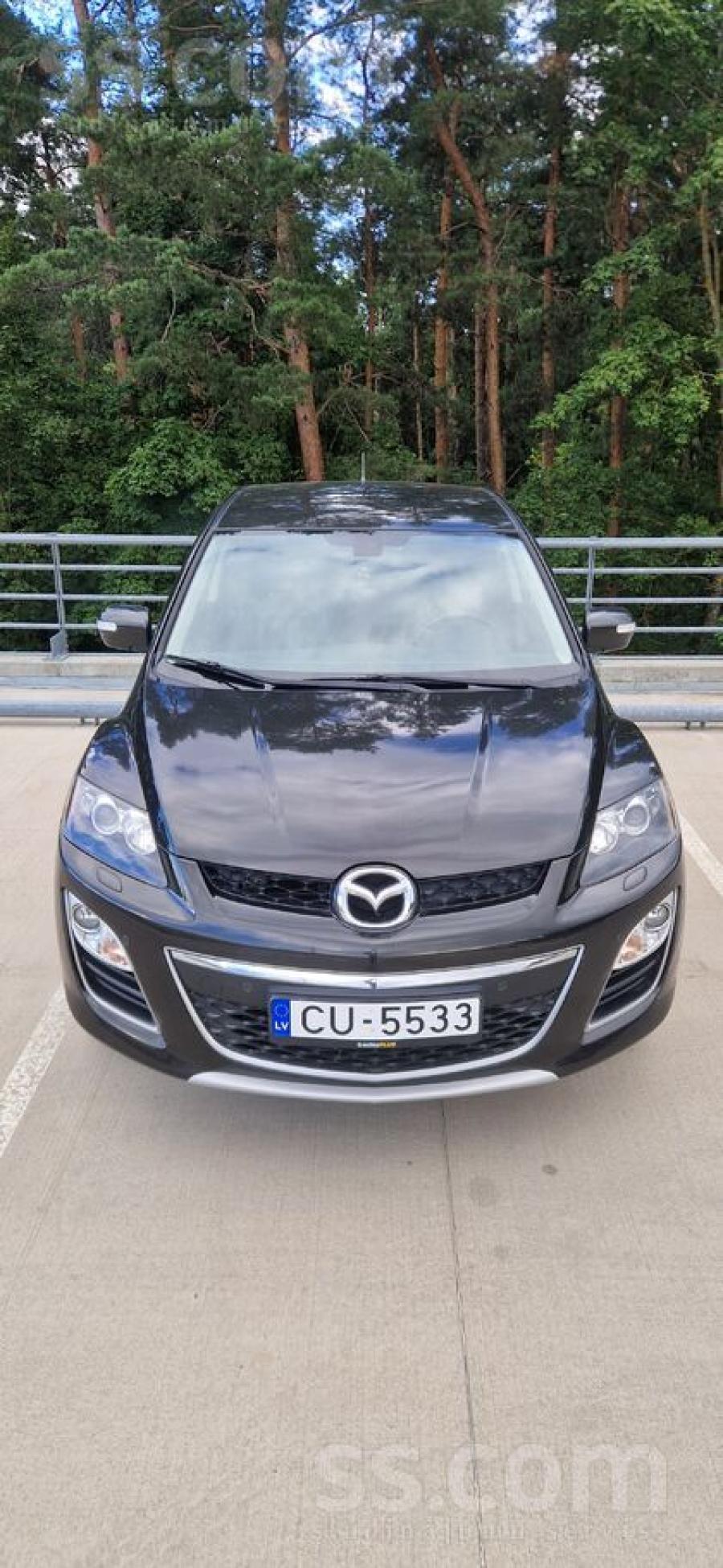 Black Mazda CX-7 2012 in Riga, with an engine capacity of 2.20 L and mileage of 200 thousand km for 4880 €, photo 1 on AUTOMOTO.COM.LV