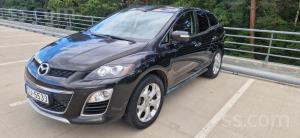 Black Mazda CX-7 2012 in Riga, with an engine capacity of 2.20 L and mileage of 200 thousand km for 4880 €, photo 3 on AUTOMOTO.COM.LV