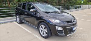 Black Mazda CX-7 2012 in Riga, with an engine capacity of 2.20 L and mileage of 200 thousand km for 4880 €, photo 4 on AUTOMOTO.COM.LV