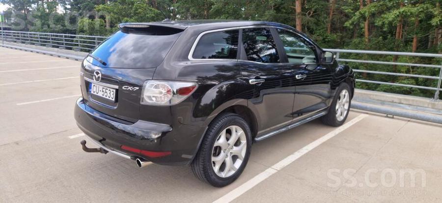 Black Mazda CX-7 2012 in Riga, with an engine capacity of 2.20 L and mileage of 200 thousand km for 4880 €, photo 6 on AUTOMOTO.COM.LV
