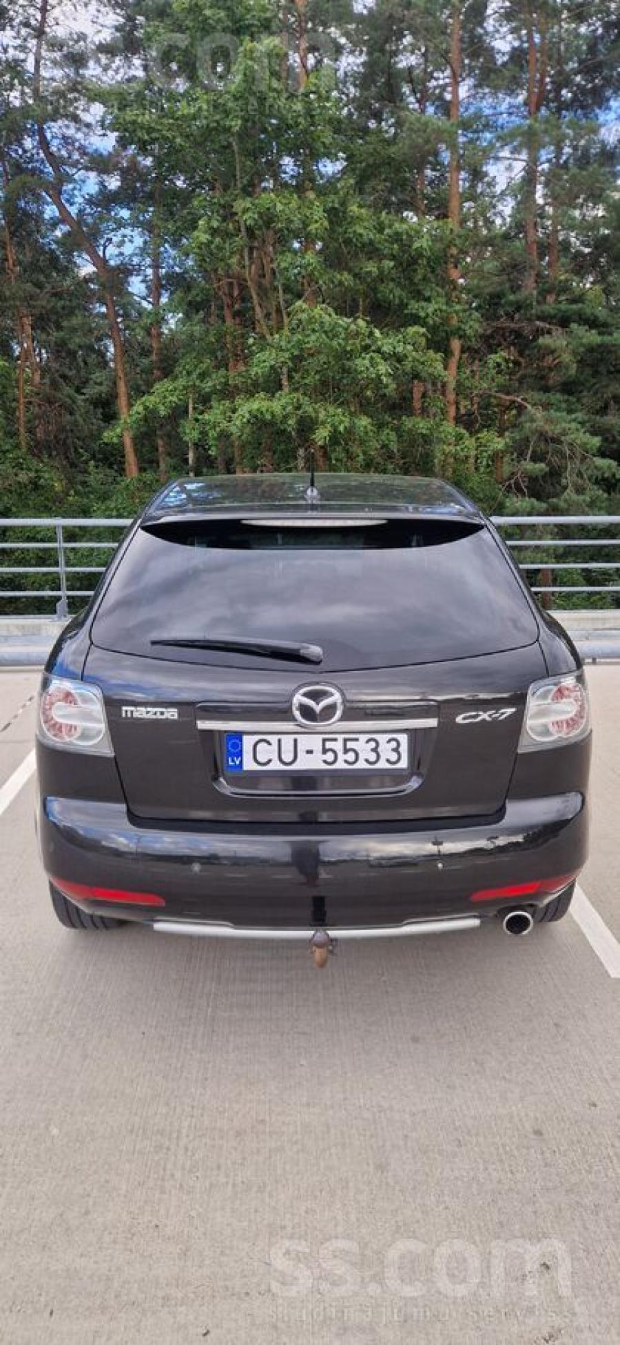 Black Mazda CX-7 2012 in Riga, with an engine capacity of 2.20 L and mileage of 200 thousand km for 4880 €, photo 7 on AUTOMOTO.COM.LV
