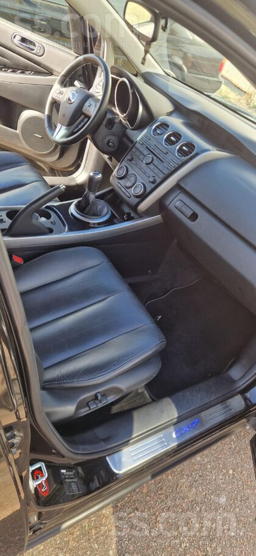 Black Mazda CX-7 2012 in Riga, with an engine capacity of 2.20 L and mileage of 200 thousand km for 4880 €, photo 10 on AUTOMOTO.COM.LV