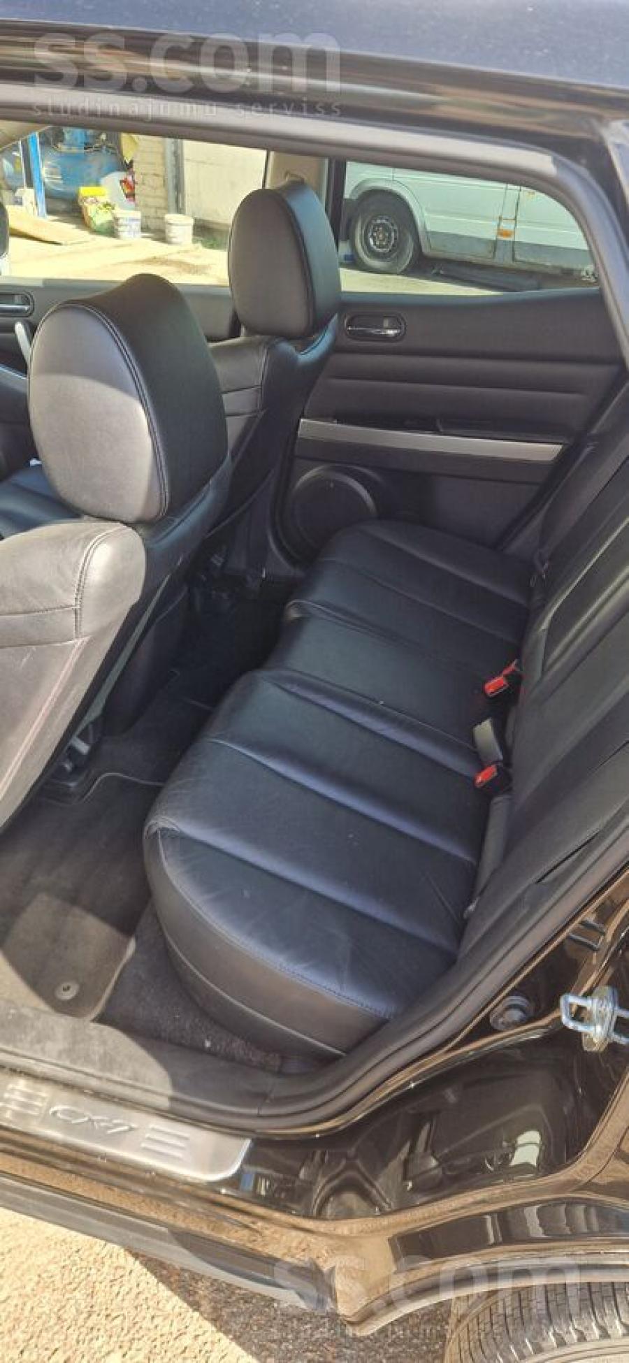 Black Mazda CX-7 2012 in Riga, with an engine capacity of 2.20 L and mileage of 200 thousand km for 4880 €, photo 11 on AUTOMOTO.COM.LV