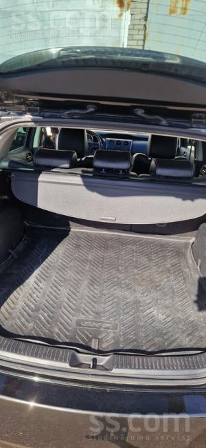 Black Mazda CX-7 2012 in Riga, with an engine capacity of 2.20 L and mileage of 200 thousand km for 4880 €, photo 12 on AUTOMOTO.COM.LV