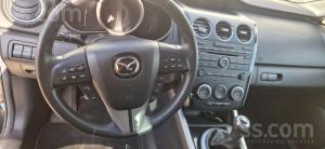 Black Mazda CX-7 2012 in Riga, with an engine capacity of 2.20 L and mileage of 200 thousand km for 4880 €, photo 15 on AUTOMOTO.COM.LV