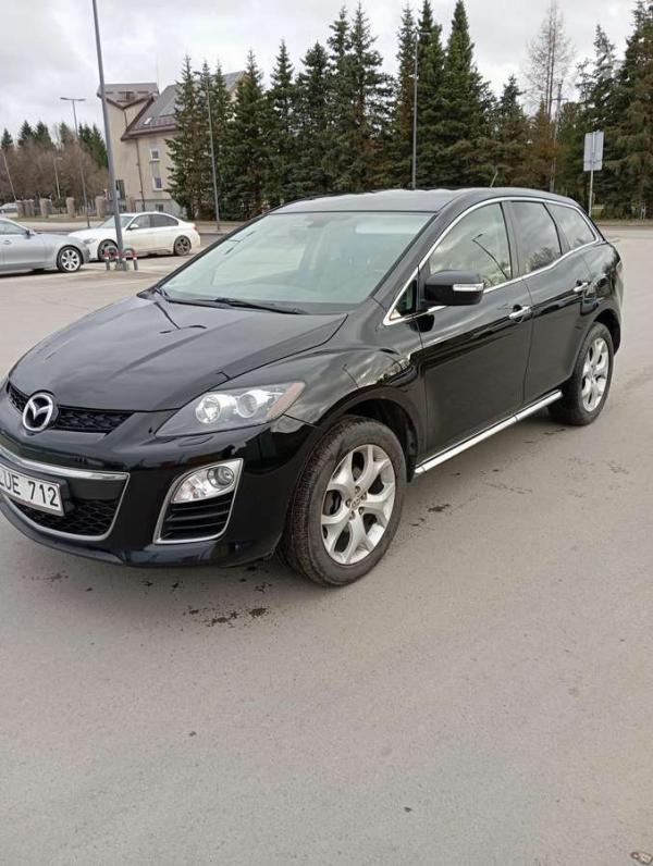 Melns Mazda CX-7 2012 Plungė, ar dzinēja tilpumu 2.20 L un nobraukumu 215 tūkst. km par 4100 €, foto 8 vietnē AUTOMOTO.COM.LV