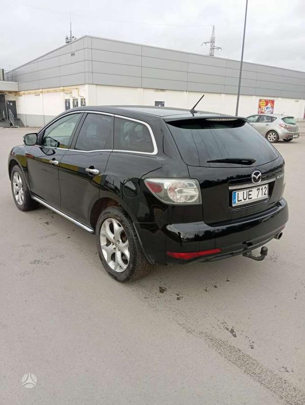 Melns Mazda CX-7 2012 Plungė, ar dzinēja tilpumu 2.20 L un nobraukumu 215 tūkst. km par 4100 €, foto 10 vietnē AUTOMOTO.COM.LV