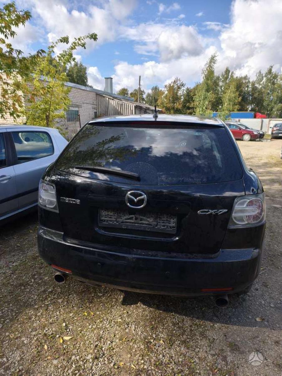 Black Mazda CX-7 2008 in Panevezys, with an engine capacity of 2.30 L and mileage of 210 thousand km for 950 €, photo 3 on AUTOMOTO.COM.LV